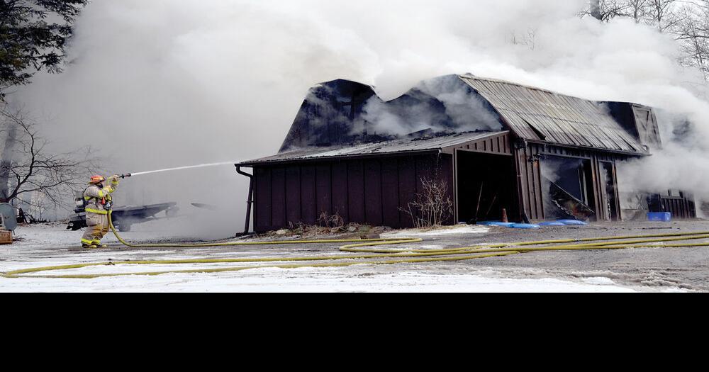 Scugog, Clarington firefighters battle shed fire south of Blackstock