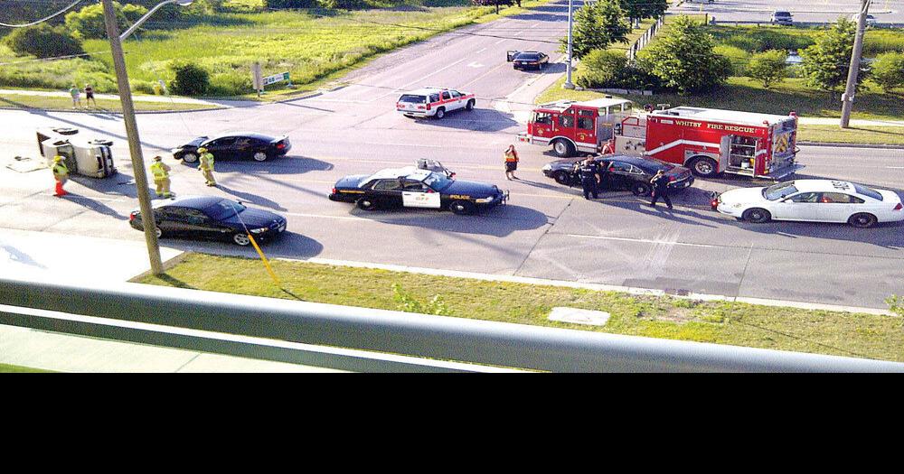 Truck rolls over in Whitby crash