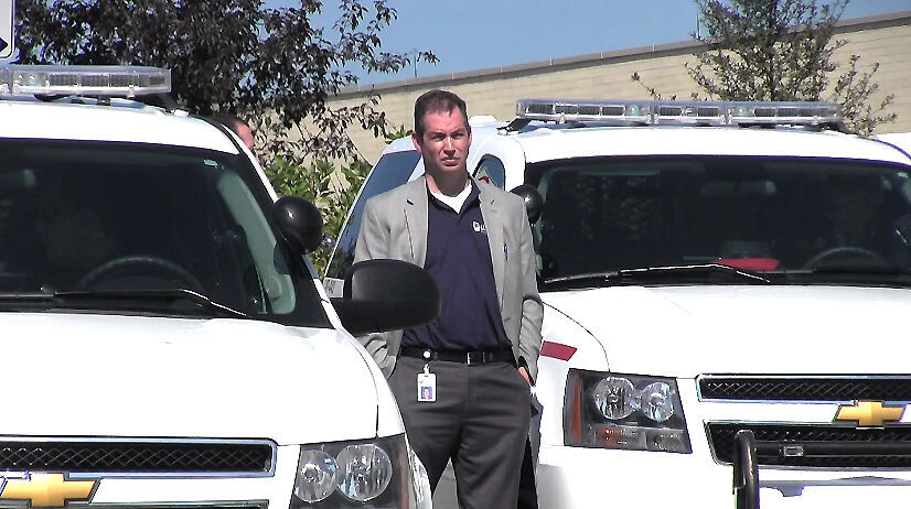 Pickets struck by car at Durham headquarters