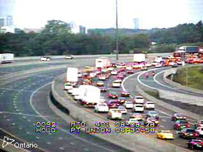 Truck crash closes 401 express lanes through west Pickering