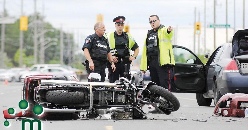 Whitby motorcycle crash sends driver to hospital