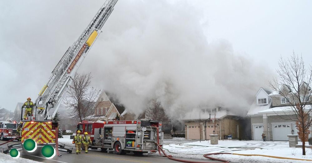 Whitby firefighters battling basement fire