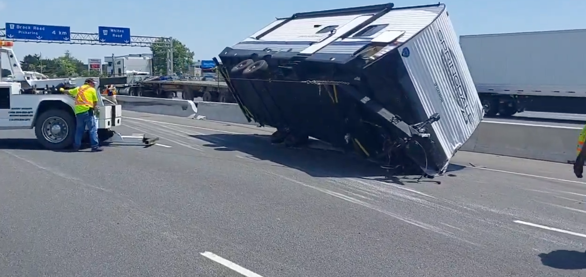 Tractor-trailer rollover closes Highway 401 in Pickering