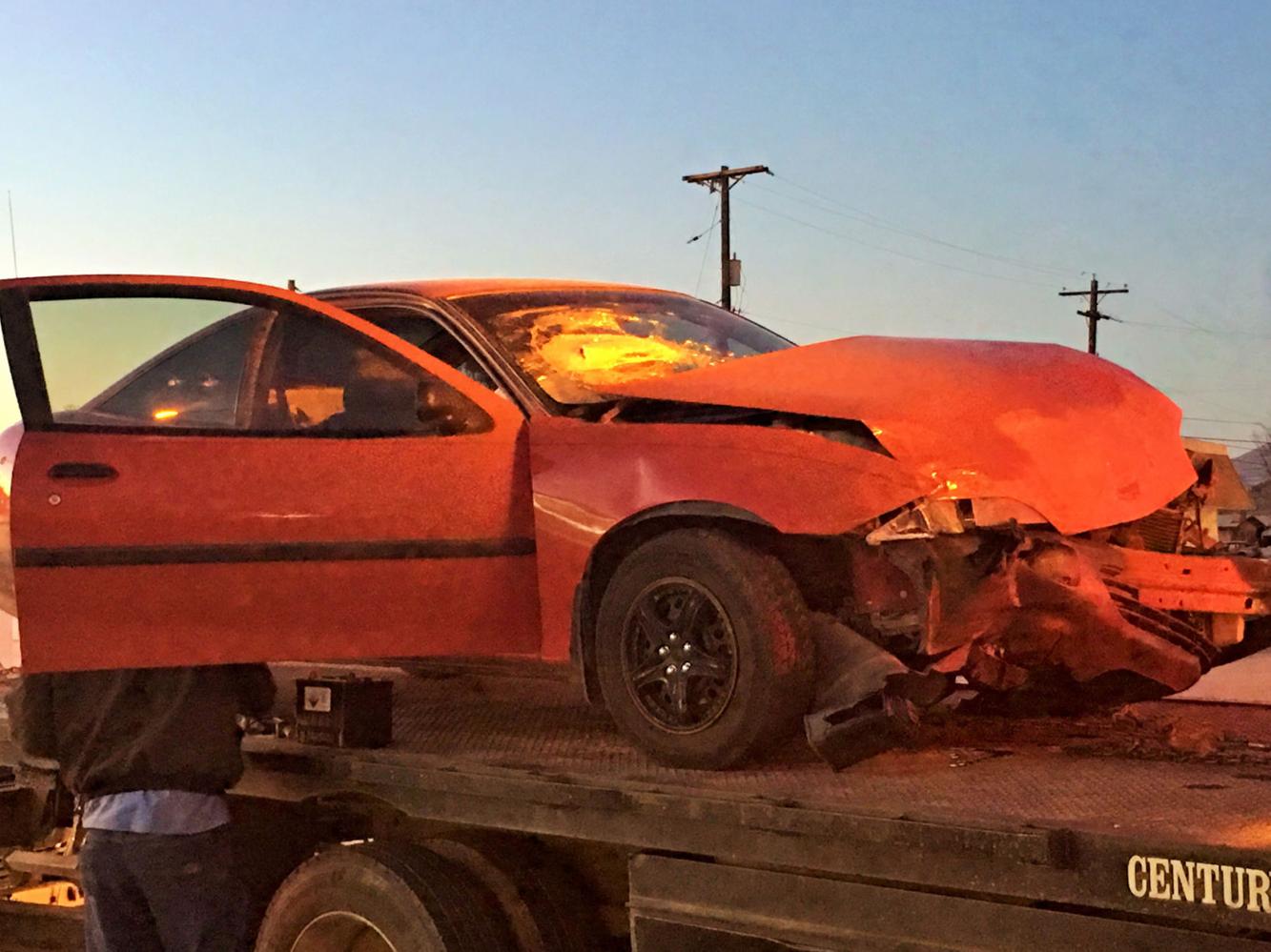 Red light runner crashes, temporarily closes highway intersection ...