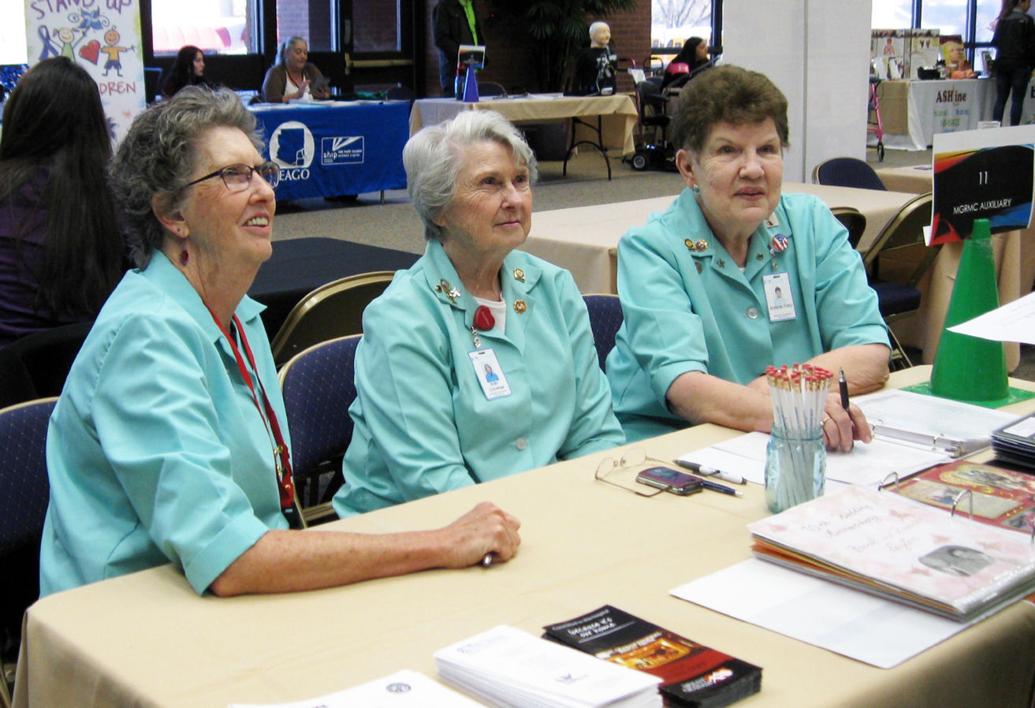 Auxiliary members help serve at Health Fair | Local News | eacourier.com