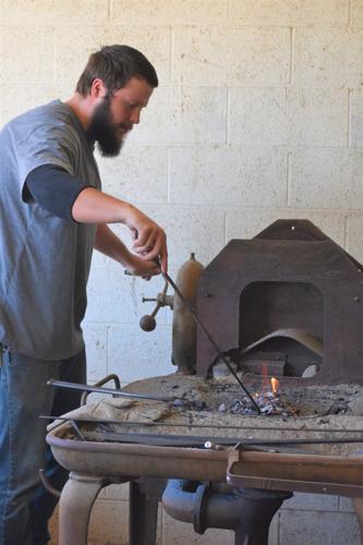 Testing mettle against metal: Self-taught blacksmith Max Maxwell has ...