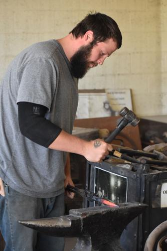 Testing mettle against metal: Self-taught blacksmith Max Maxwell has ...