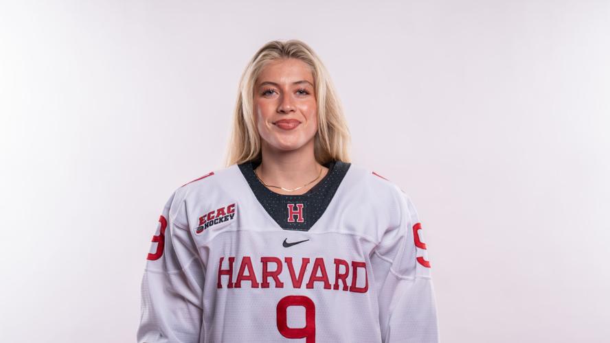 A celebratory Lapp with the Beanpot Trophy | Sports | eagletribune.com