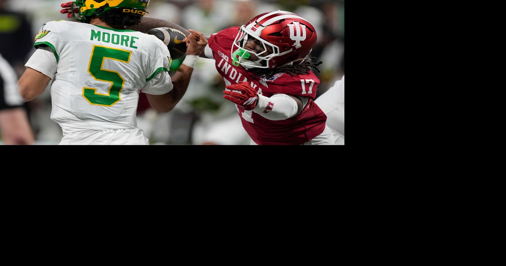 Dante Moore and the Oregon Ducks self-destruct in 56-22 Peach Bowl loss ...