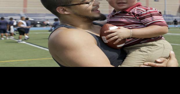 The Littlest Lancer: Dad and ailing son share football moment | Local ...