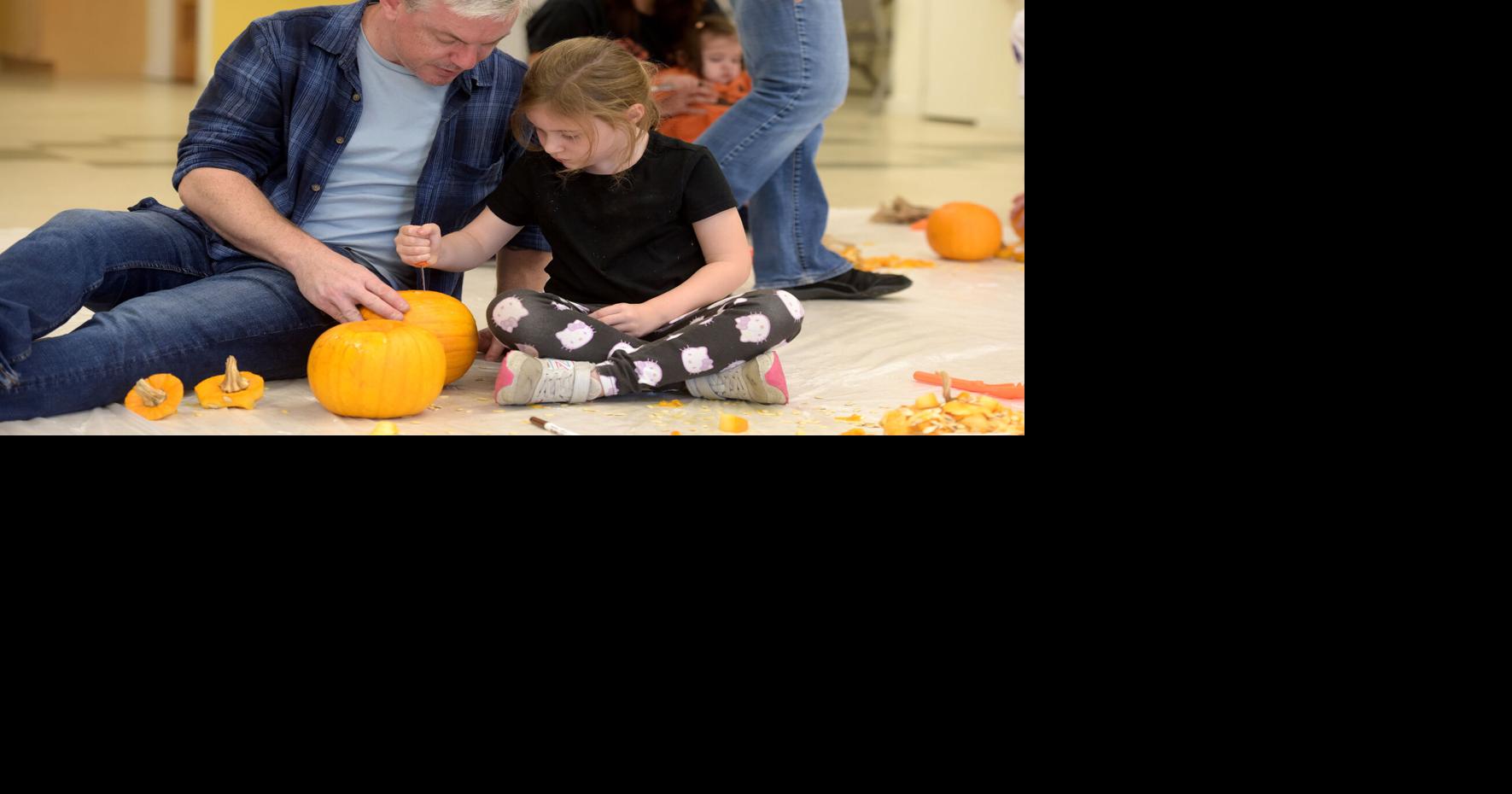 Creative carving: Families craft jack-o'-lanterns | Merrimack Valley ...