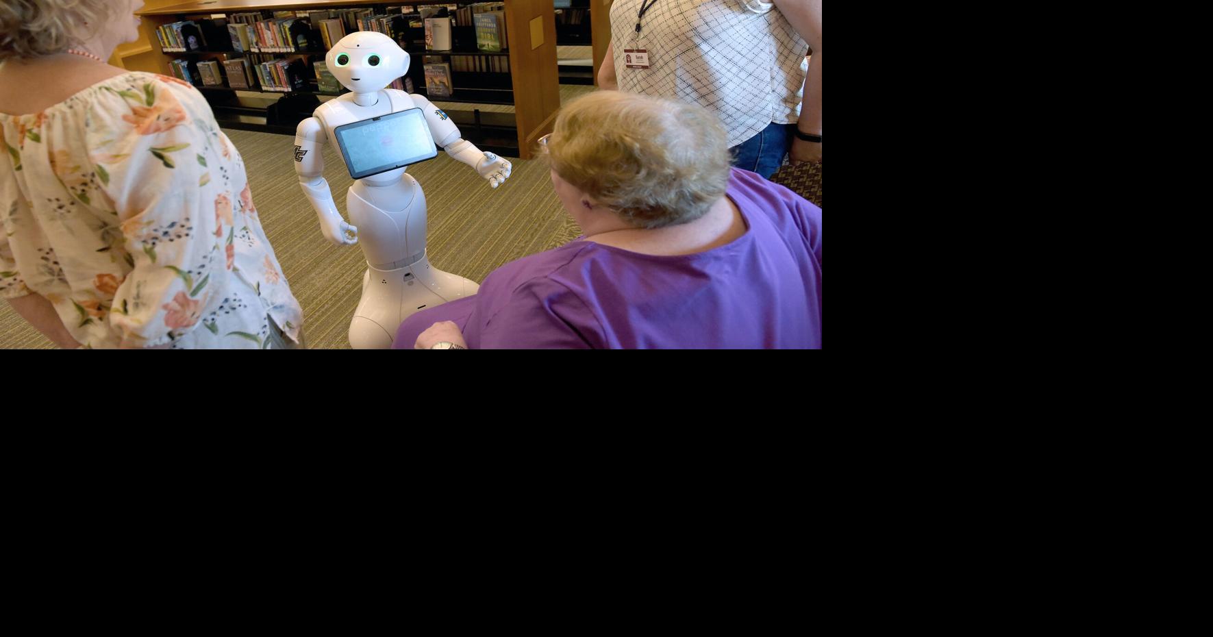 Reading robot spending the summer in the library | Merrimack Valley ...