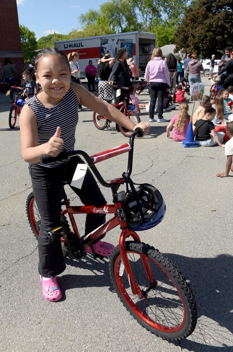Surprise bike giveaways sends 120 students home with a new ride ...
