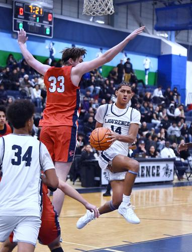 SLIDESHOW: Lawrence defeats Central Catholic in Basketball | Gallery ...