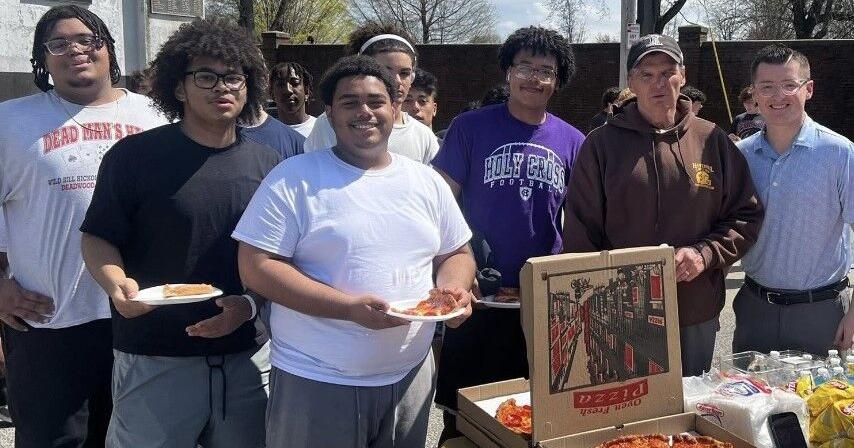 Football team tackles trash duty for Earth Day | Photos | eagletribune.com
