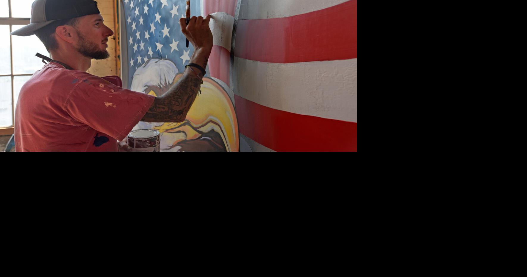 Mural Makeover: Lawrence artist repairs city's 9/11 commemorative mural ...