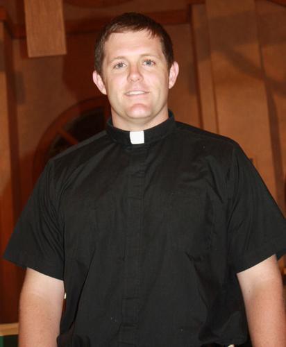 Surfing priest joins St. Michael Parish | Local News | eagletribune.com