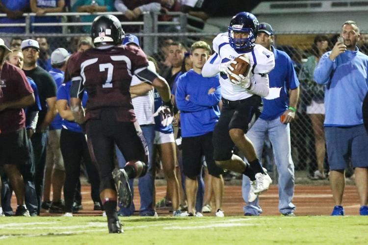 Chandler stomps Hamilton 56-24, ends Huskies' 64-game home win streak ...