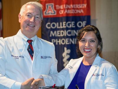 12 EV students don their white coats at UofA med school | Life ...