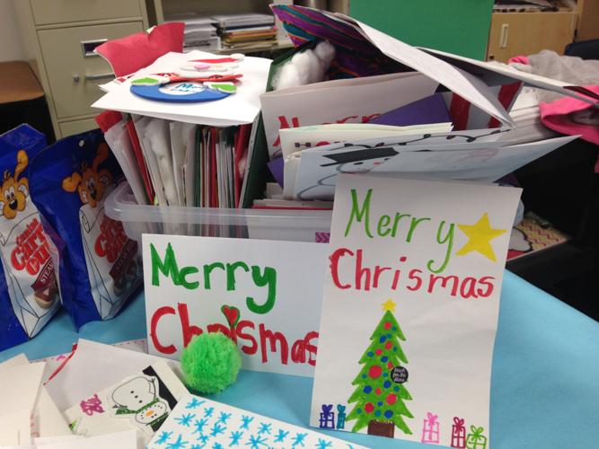 Power Ranch students write hundreds of holiday cards for troops ...