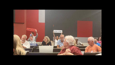 Peterson, sign carriers clash over decorum | | eastvalleytribune.com