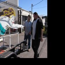 Part of motel's damaged 'Diving Lady' sign moved to Mesa mall for ...