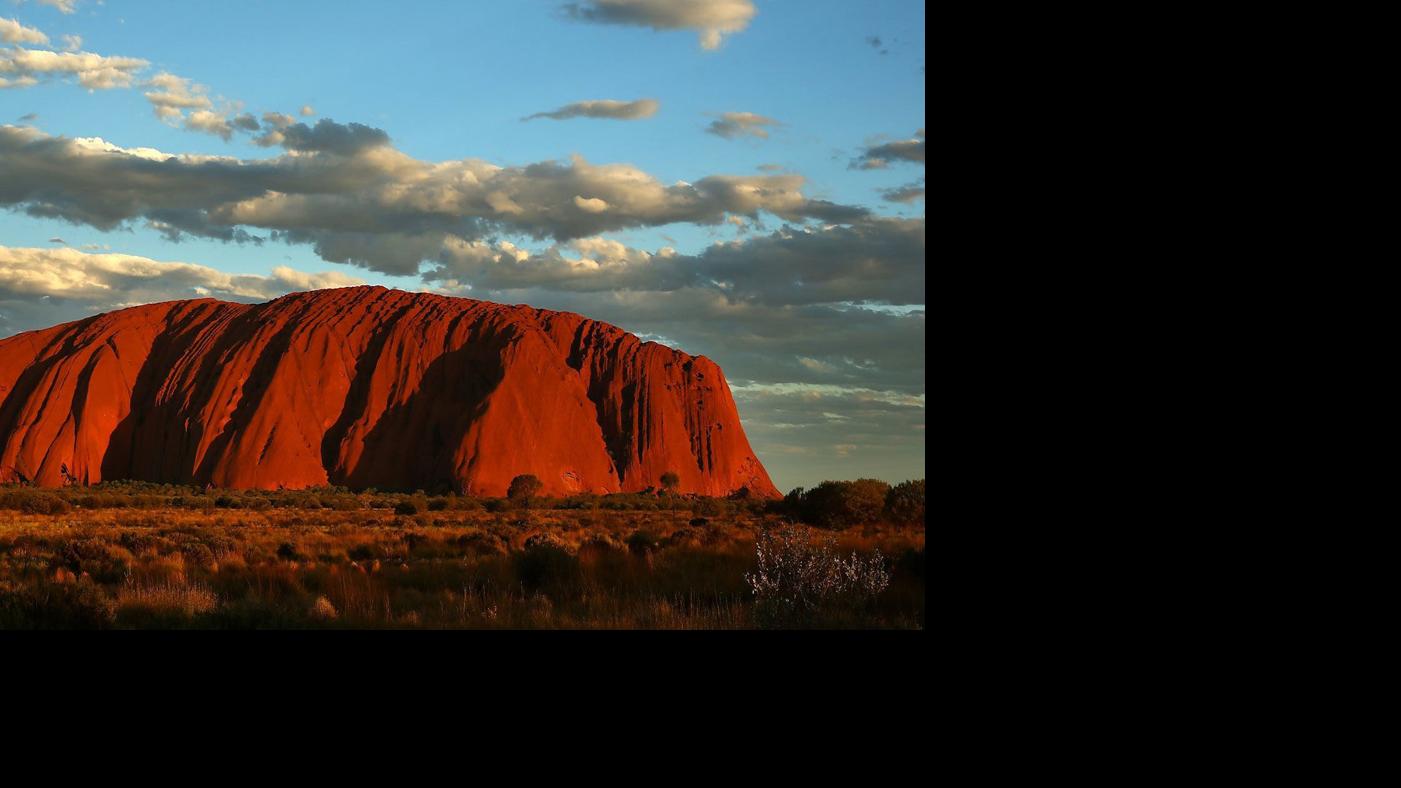 Crowds surge to Uluru, Australia's sacred red rock, before climbing ban ...