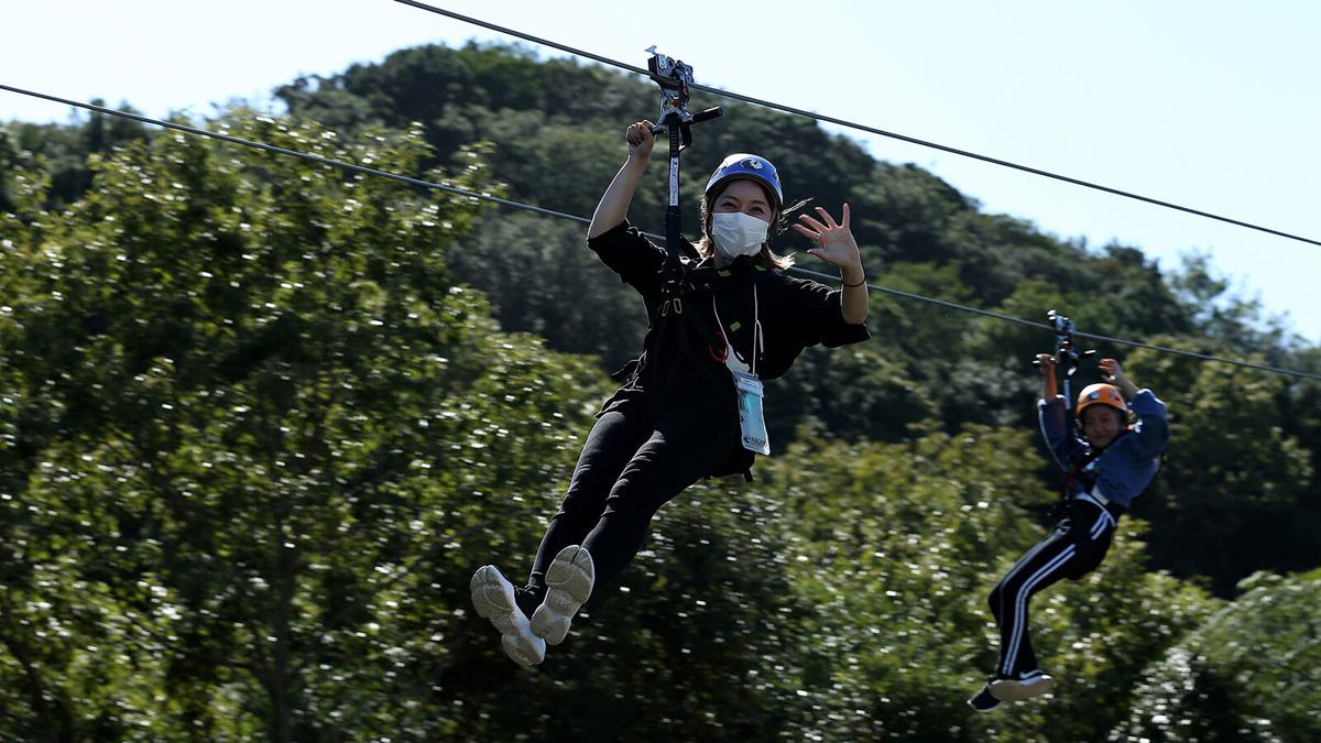 At Japan theme park, guests zipline into Godzilla's mouth | Travel ...