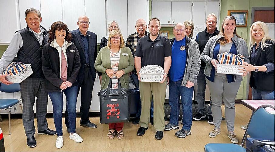 Rotarians deliver meals during Rotary Week | Community ...