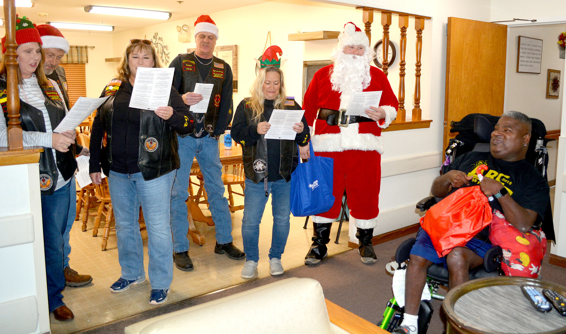 Motorcycle club delivers holiday cheer to group home residents | Local ...