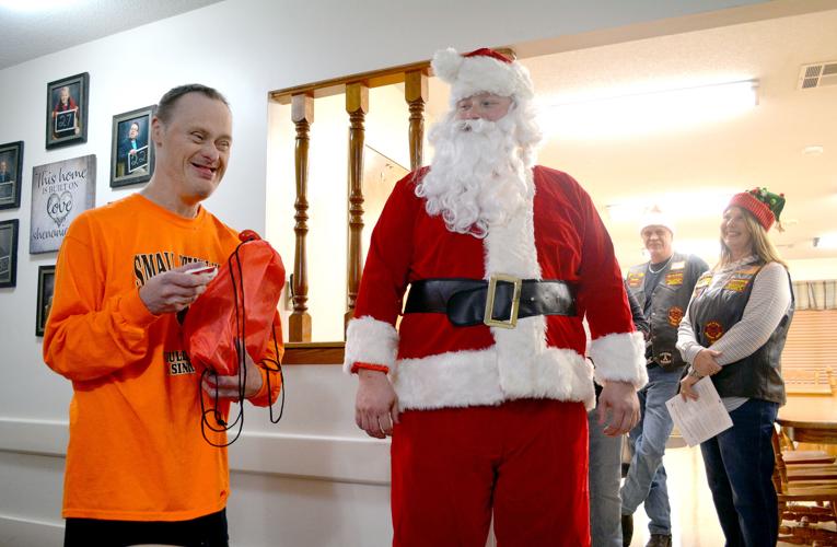 Motorcycle club delivers holiday cheer to group home residents | Local ...