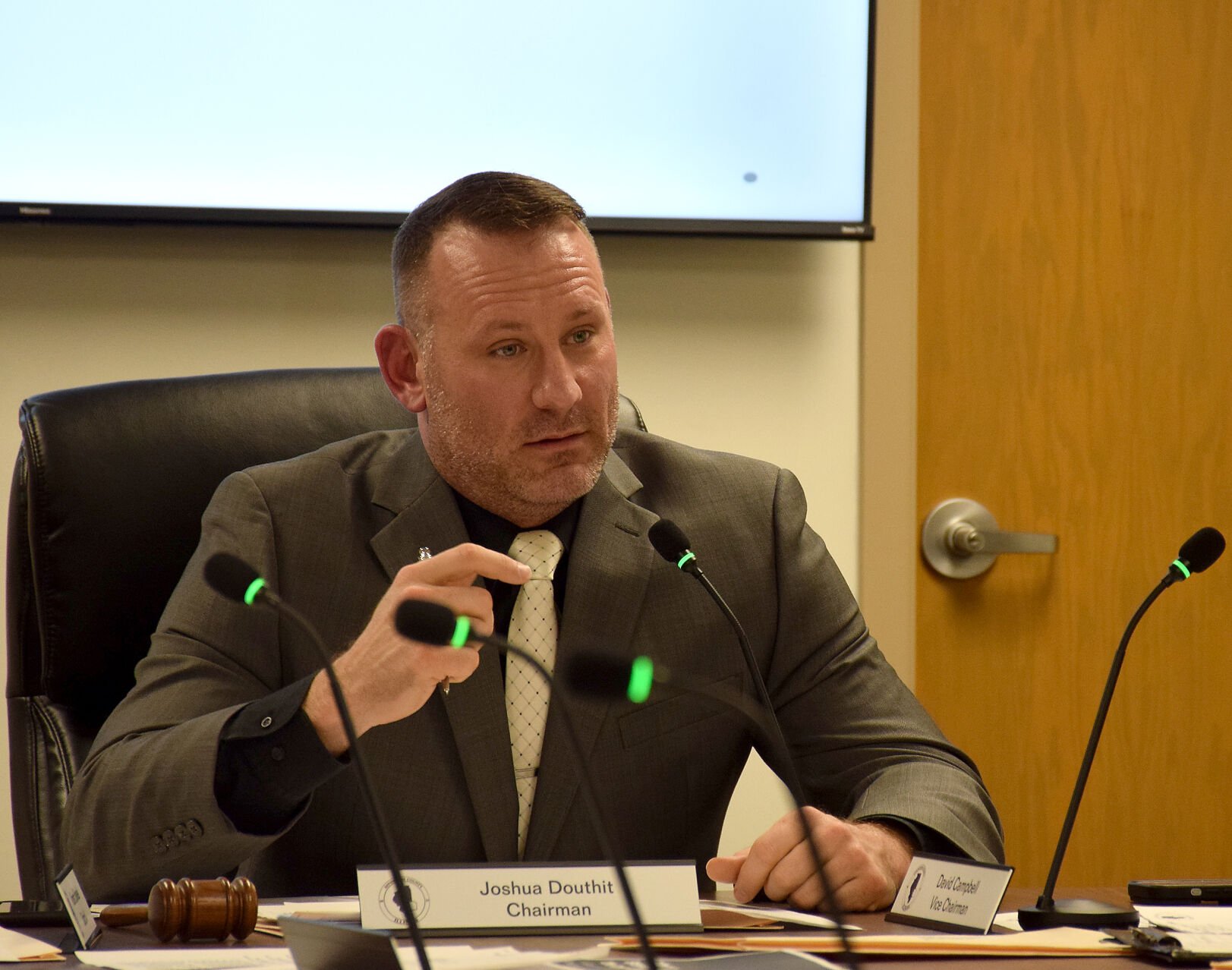 County Board OKs resolution barring non-citizens from county services ...