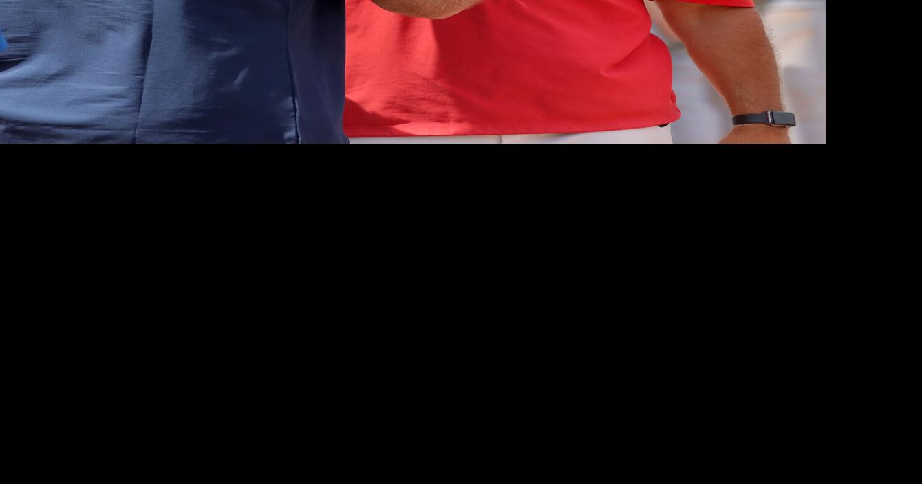 Head coaches John Frech and Jared Hoots hold a friendship with an ...