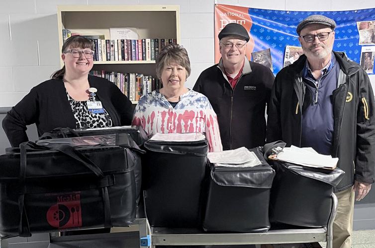 Rotarians deliver meals during Rotary Week | Community ...