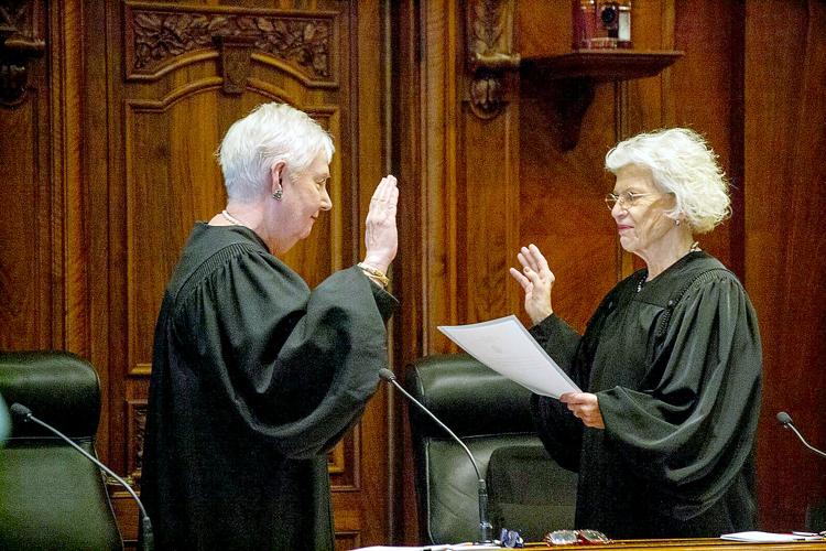 Theis, sworn in as chief justice, says partisanship has no role on ...