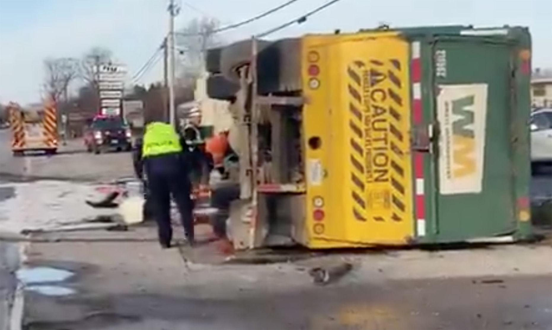 Garbage truck tipped over in crash | Hometown | elkharttruth.com
