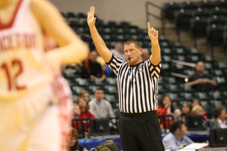 All the right calls: Referee Dave Spencer works his way into three ...