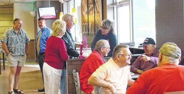 Elkin Police Officer Kim Robison meets with local residents at McDonald ...