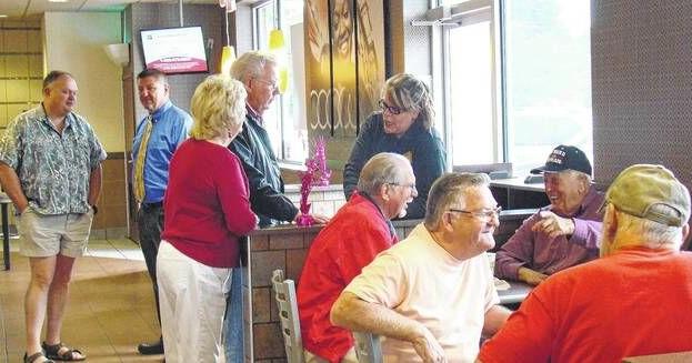 Elkin Police Officer Kim Robison meets with local residents at McDonald ...