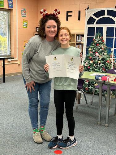 Buffey Moore, fourth grade teacher, and Elena Joyce, school winner ...