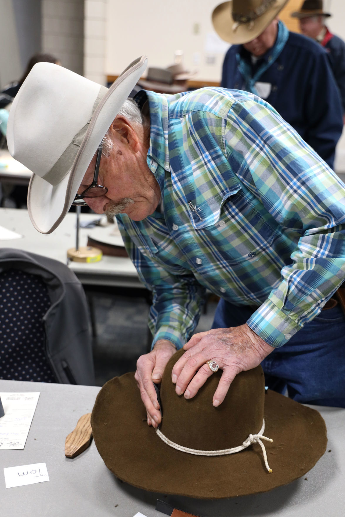 Making cowboy hats for Cowboy Poetry