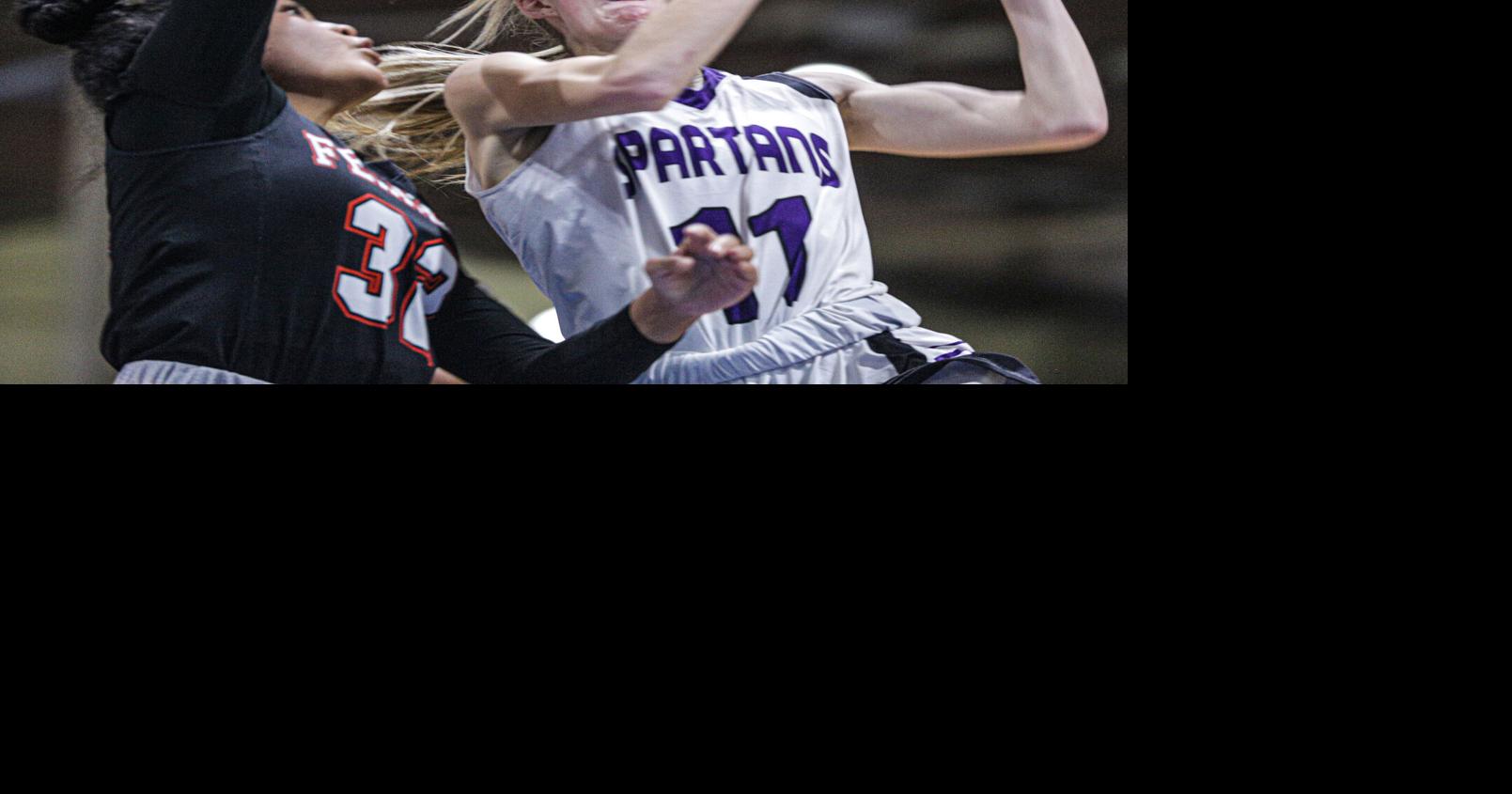 Lady Spartans hang on, advance to state tourney