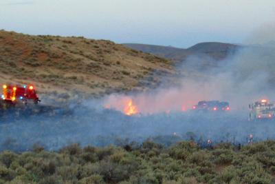 Fire burns 2 acres near shooting range