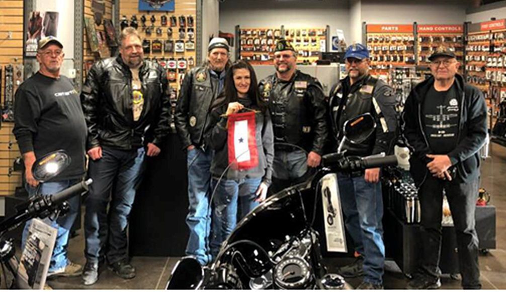 American Legion Riders present banner