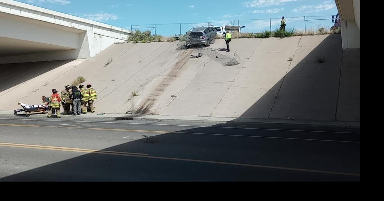 Car flies off I-80, through underpass and up other side