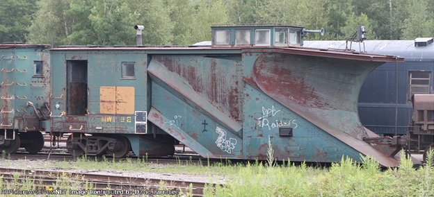By truck and crane, a train track plow makes its move | News ...