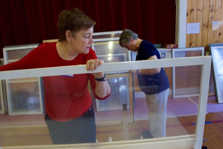 Volunteers crank out heat-saving window inserts | News ...