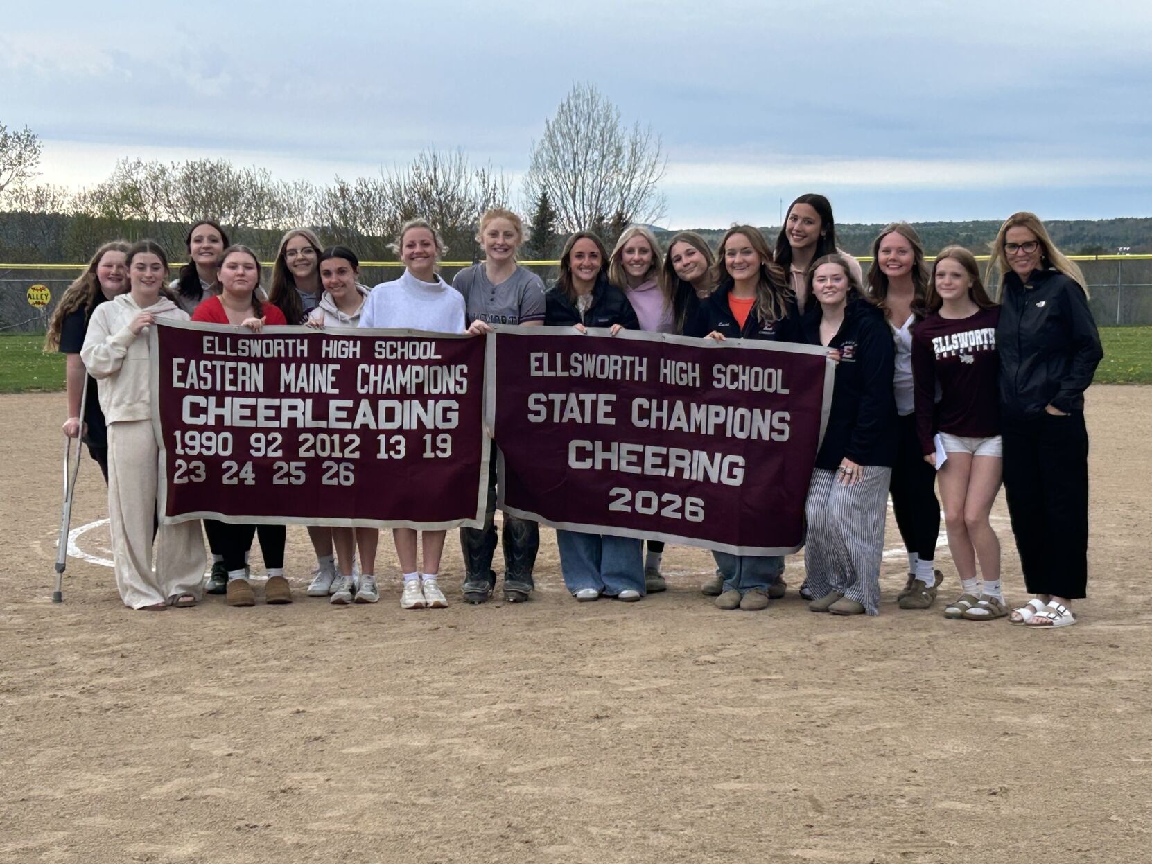 High school notebook: Ellsworth cheerleading squad presented with ...