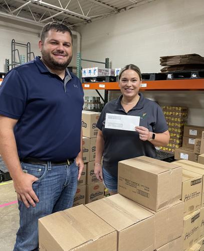 CDSA donation provides boost to Loaves & Fishes | News | enidnews.com
