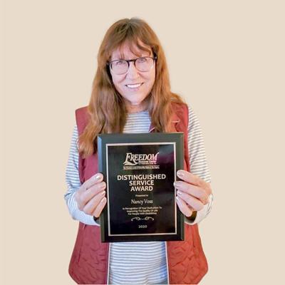 Voss recognized with Distinguished Service Award | News ...